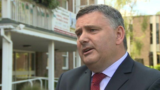 Wrexham march over plan to cut fire engine and 24 posts - BBC News