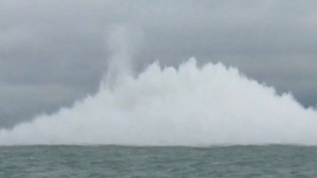 Watch World War II German sea mine being blown up - BBC News
