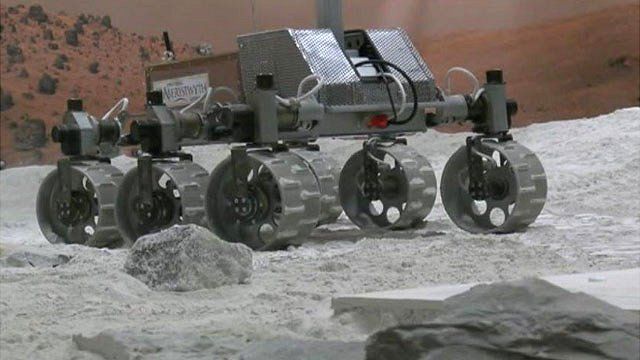 The robot taking stained glass and a 'selfie' mirror to Mars - BBC News