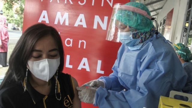 Setahun Covid-19 di Indonesia: 'Tingkat kesulitan semakin berat', ancaman '20.000 kasus per hari ...