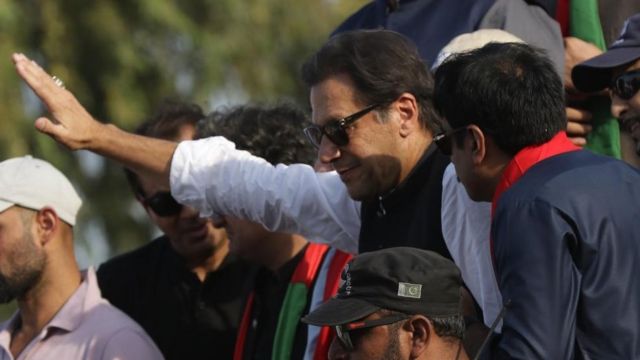 Imran Khan: Pakistan ex-PM shot and wounded inside one protest march ...