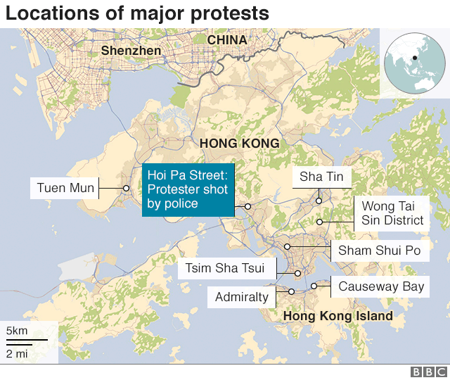 China anniversary: Hong Kong protester shot by live round - BBC News