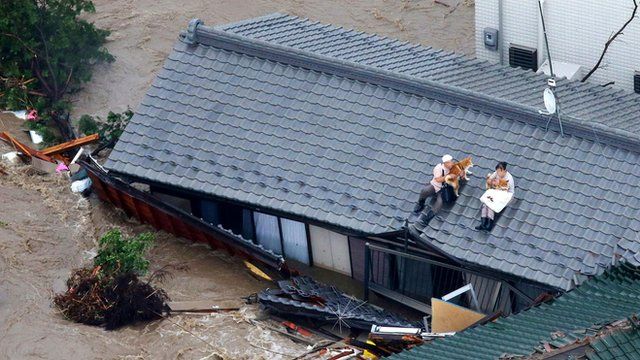 Japan floods: Rescue work continues amid deadly floods - BBC News