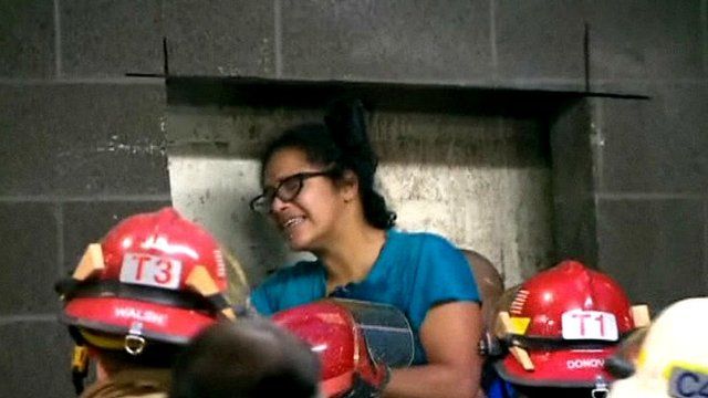 US woman trapped behind wall for four hours - CBBC Newsround