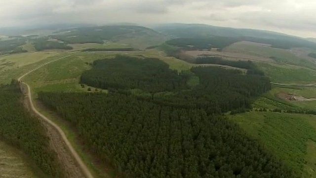 Pen-Y-Cymoedd onshore wind farm generates its first power - BBC News