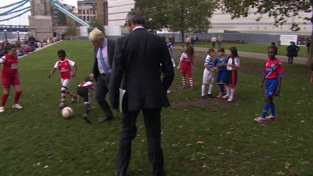 Boris Johnson knocks child to ground in touch rugby - BBC News
