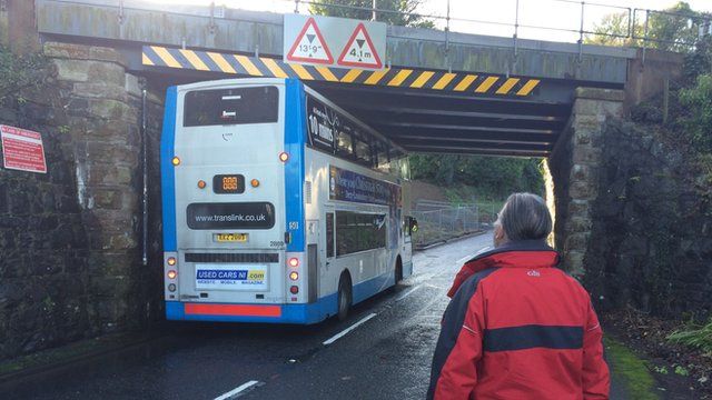 Double decker bus strikes bridge prompting safety investigation - BBC News