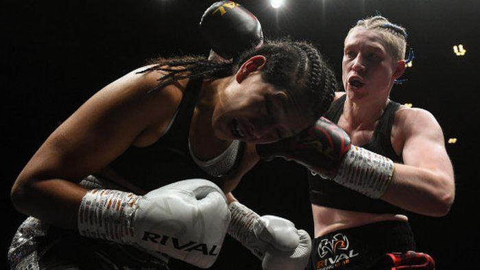 Female boxing champion inspires Jersey children - BBC News