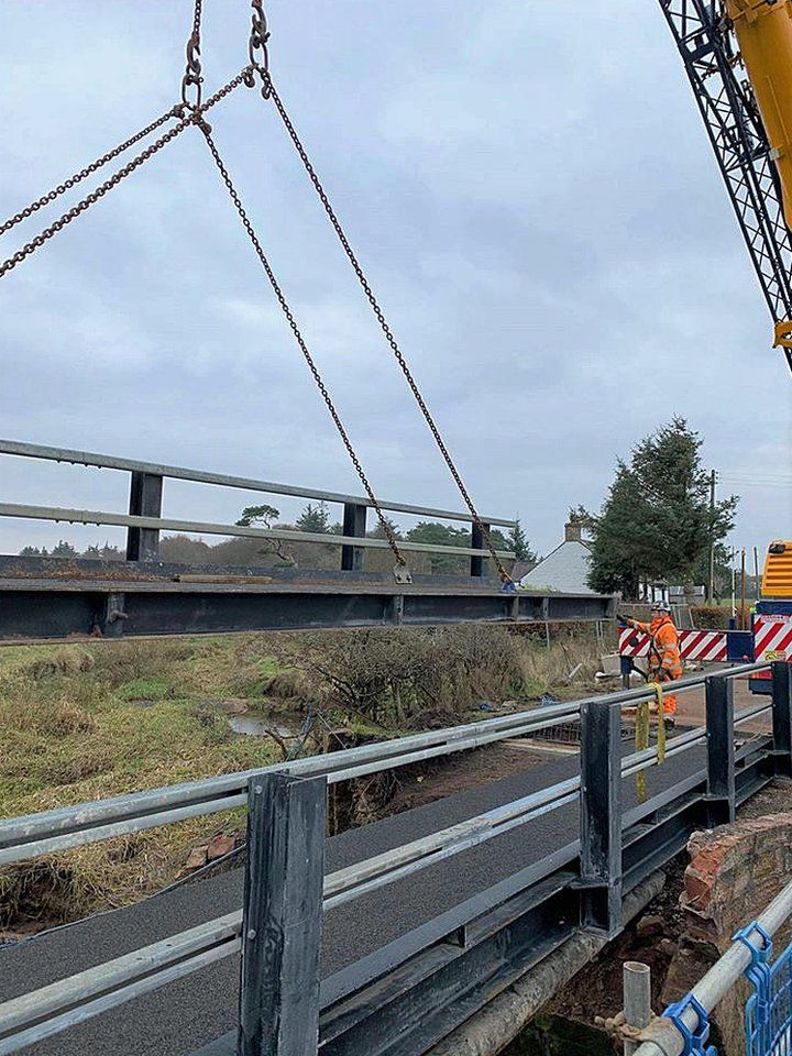 Robert Burns' Brow Well bathing spot bridge put in place - BBC News