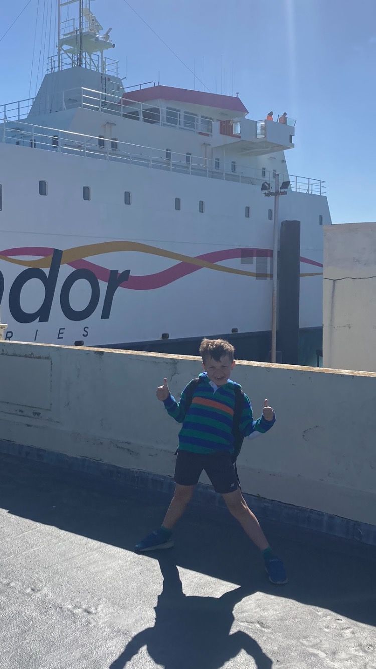 Condor Islander fan George Foote waits for ferry to dock - BBC News