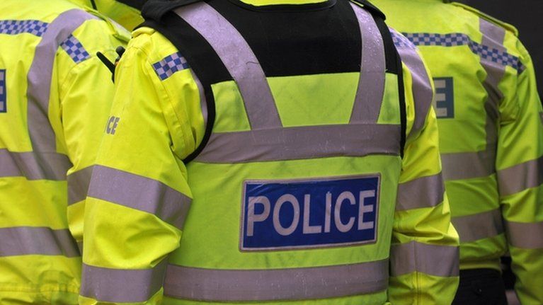 EDL supporters march through Walsall - BBC News