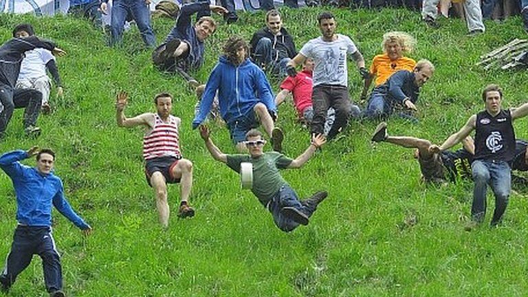 Cheese-rolling veteran equals all-time record - BBC News