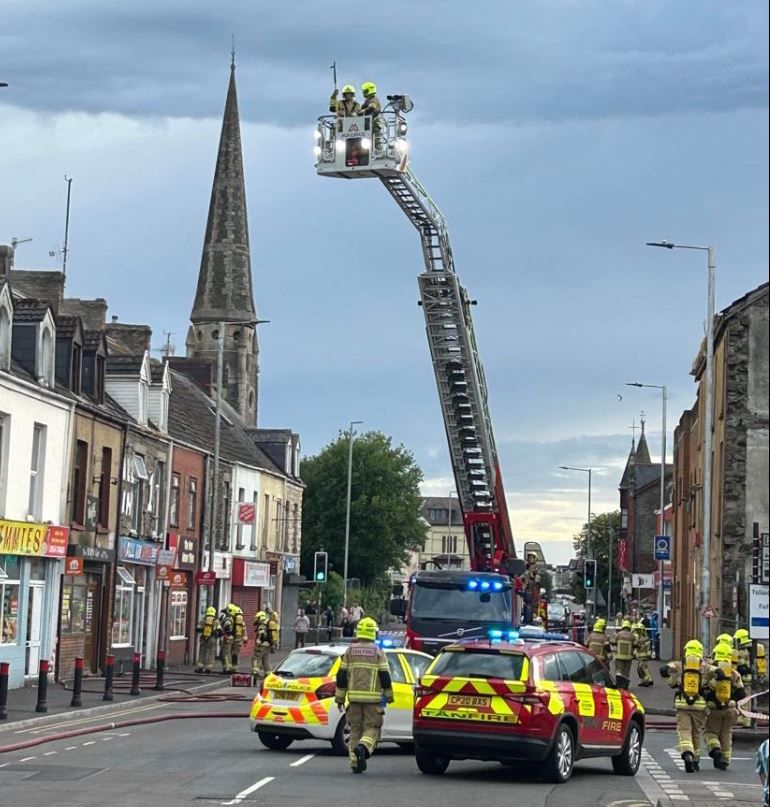 Carmarthenshire: Two homes and takeaway damaged in fire - BBC News