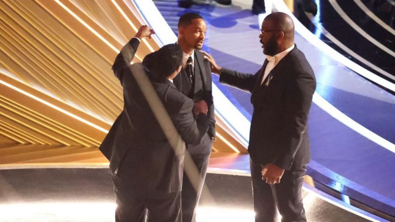 Will Smith hits Chris Rock on Oscars stage - BBC News