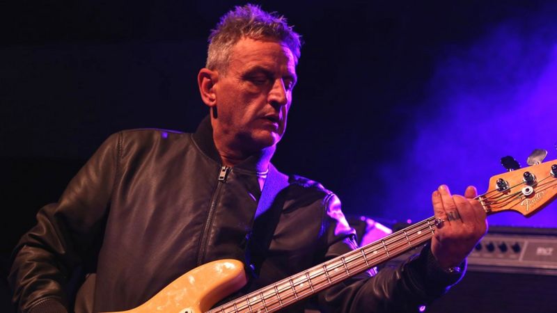 Paul Ryder: Happy Mondays bassist and Shaun's brother dies at 58 - BBC News