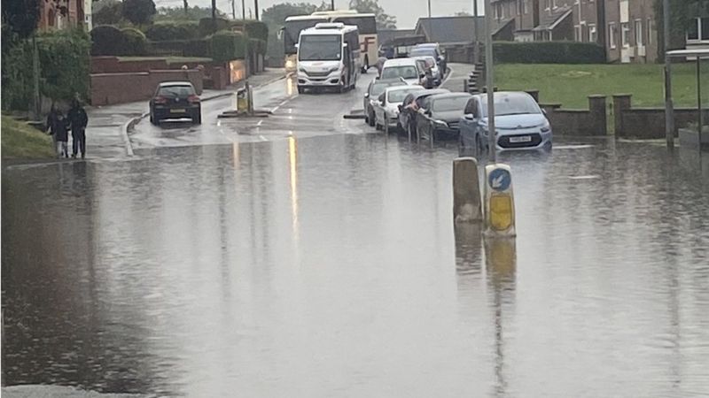 Wrexham: Flash floods and impassable roads after rain - BBC News