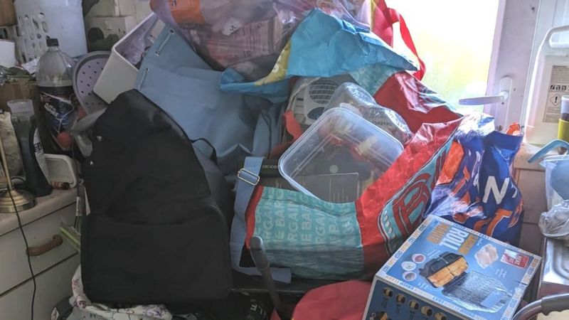 Hoarding: Woman embarrassed to have visitors - BBC News