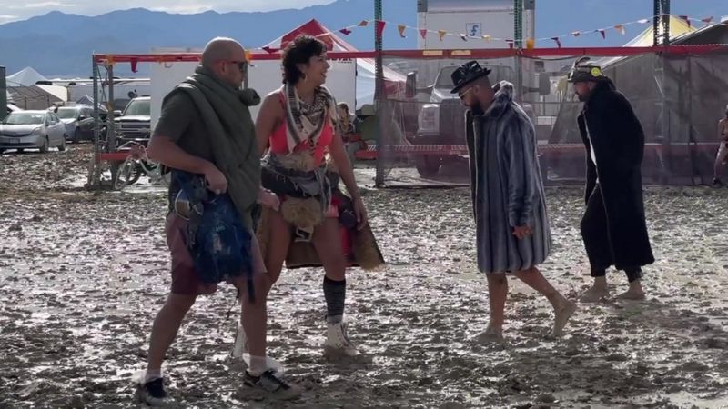 Burning Man: Police investigating death during heavy rain - BBC News