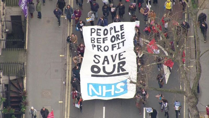 NHS protest: Tens of thousands march against 'hospital cuts' - BBC News
