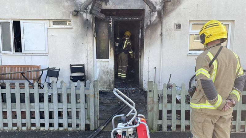 Gosport woman rescued from fire caused by tumble dryer - BBC News