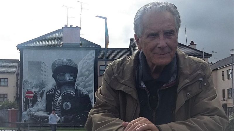 Paddy Coyle: Man from iconic 'boy in the mask' photo dies - BBC News