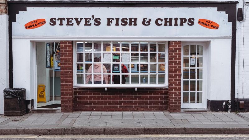 Images show 'never changing face of British chip shops' - BBC News