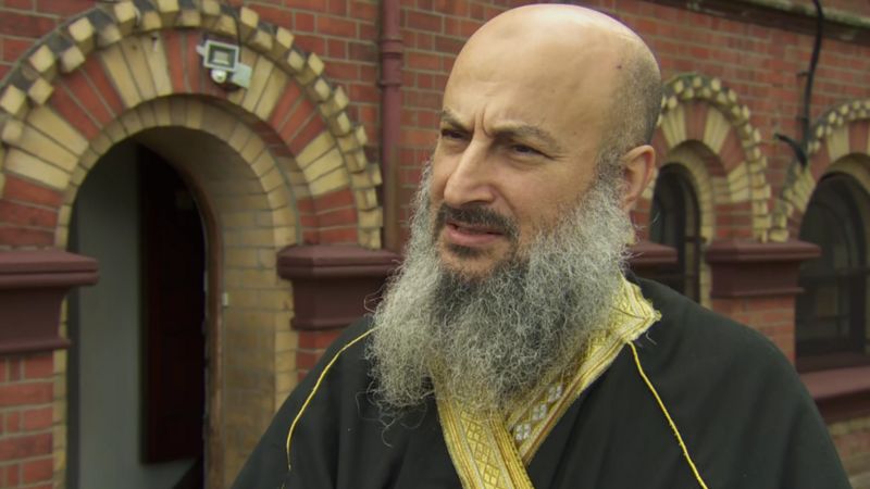Belfast mosque leader's worries after Nazi flags flown nearby - BBC News