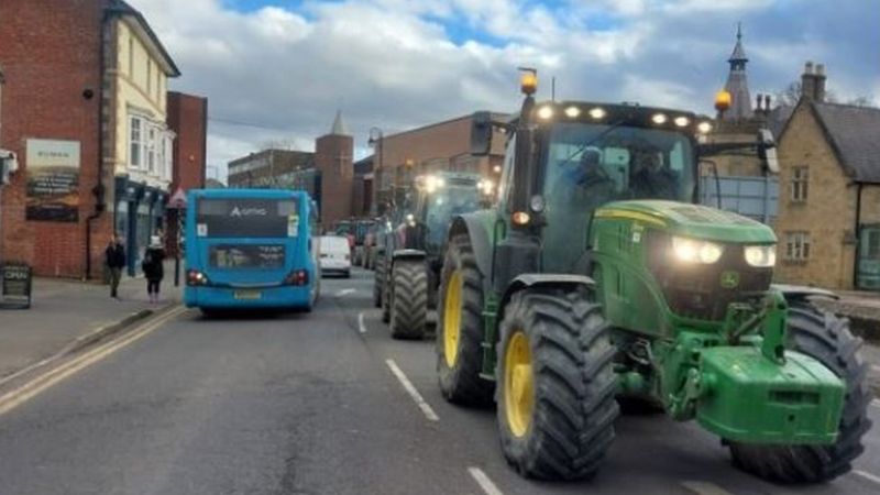 Wrexham arrest after farmers blocks city in protest - BBC News