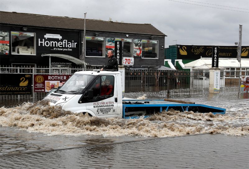 Torrential downpours flood parts of northern England - BBC News