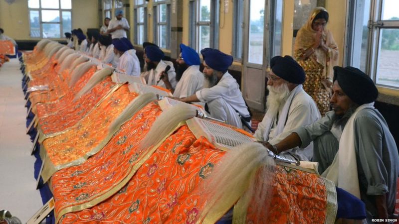 Indians pray at visa temples to go abroad - BBC News