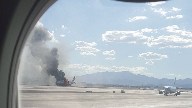 British Airways plane catches fire in Las Vegas - BBC News