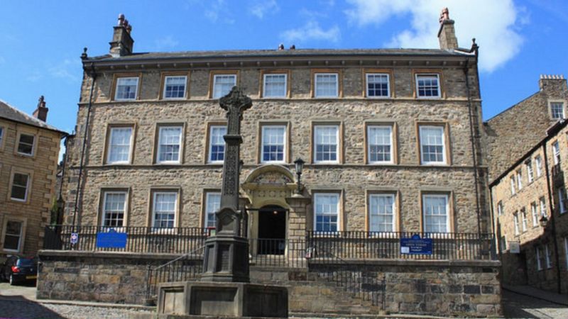 Burnley textile mill museum reopens after three years - BBC News
