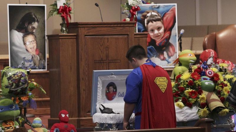 Superhero funeral for school shooting victim - BBC News