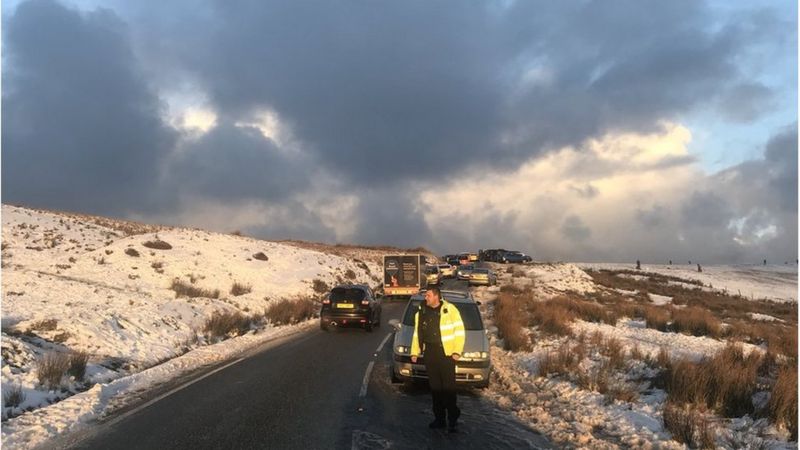100 cars block Preseli Hills mountain road in snow - BBC News
