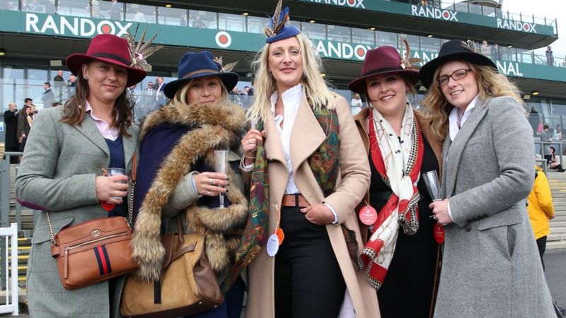 Grand National: Princess Royal joins crowds returning to Aintree - BBC News