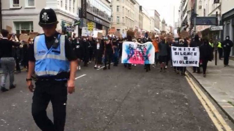 Brighton George Floyd protesters march to police station - BBC News