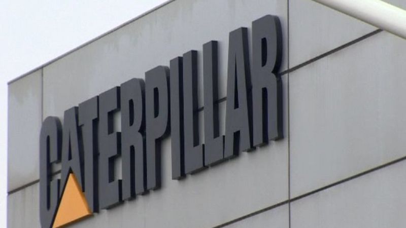 Caterpillar workers in Larne and Belfast strike over pay - BBC News