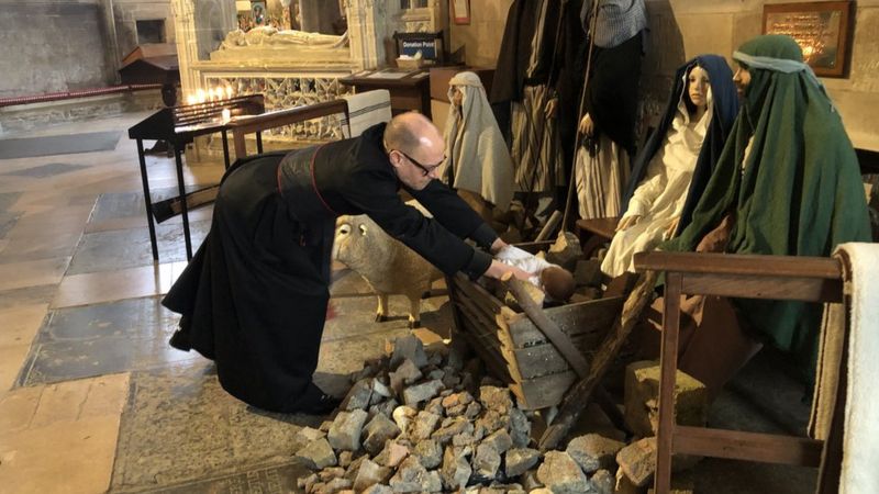 Tewkesbury Abbey's rubble nativity scene highlights children affected ...