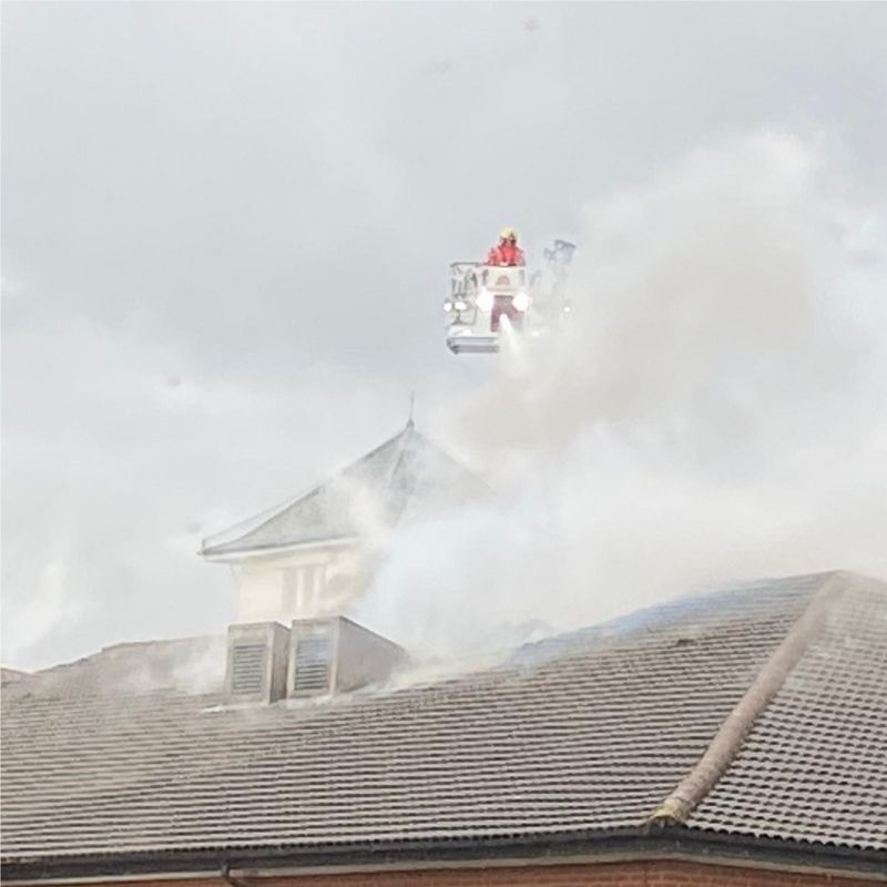 Trafford General: Lightning strike sets hospital roof on fire - BBC News