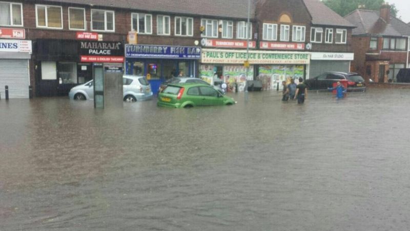 Children rescued as flash floods hit parts of UK - BBC News