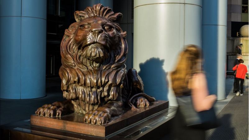 HSBC shares slide after 62% profit fall - BBC News