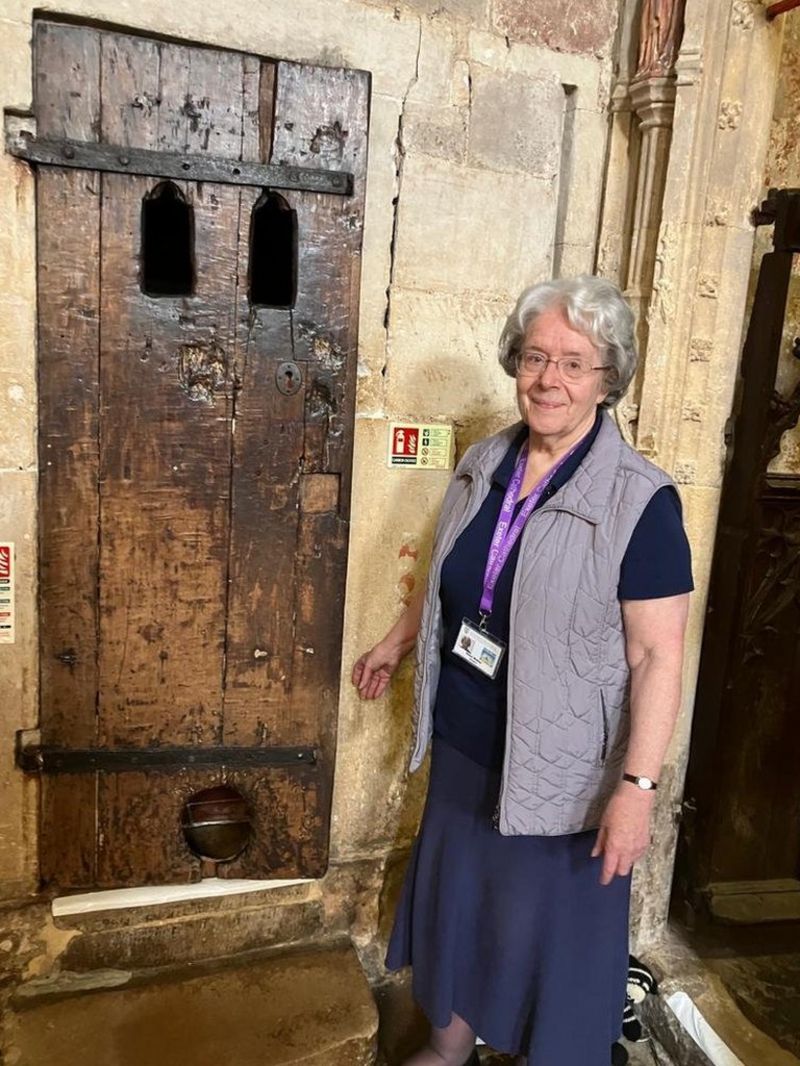 Exeter Cathedral door hole could be world's oldest cat flap - BBC News