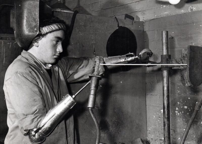 Pictures of how disabled people trained to work in factories - BBC News