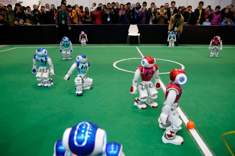 China robot event showcases service, sport and dancing robots - BBC News