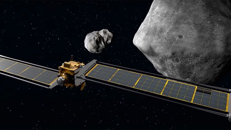 Dimorphos: Nasa flies spacecraft into asteroid in direct hit - BBC News