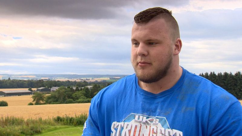 Tom Stoltman: Scot lifts World's Strongest Man title - BBC News