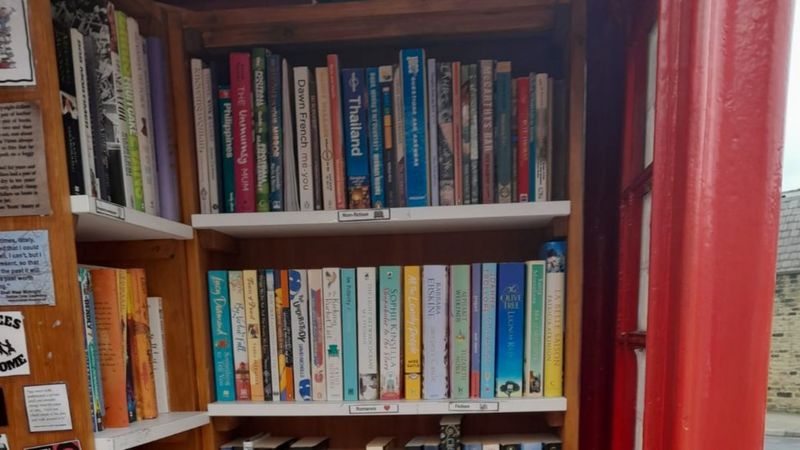 Elland Book Swap phone box celebrates first birthday - BBC News