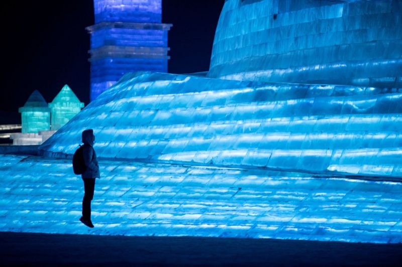 Towering ice palaces at China's Harbin Ice Festival - BBC News