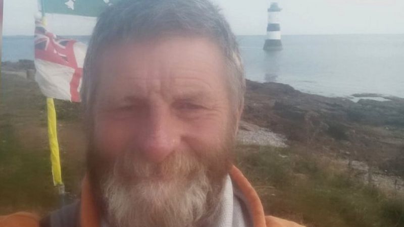Lighthouse fan completes epic British coast walk for charity - BBC News