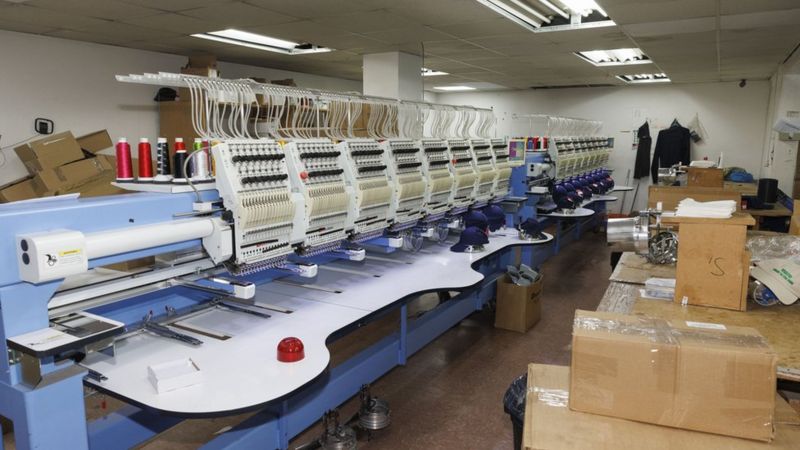 Fake designer logo factory raided in Manchester - BBC News